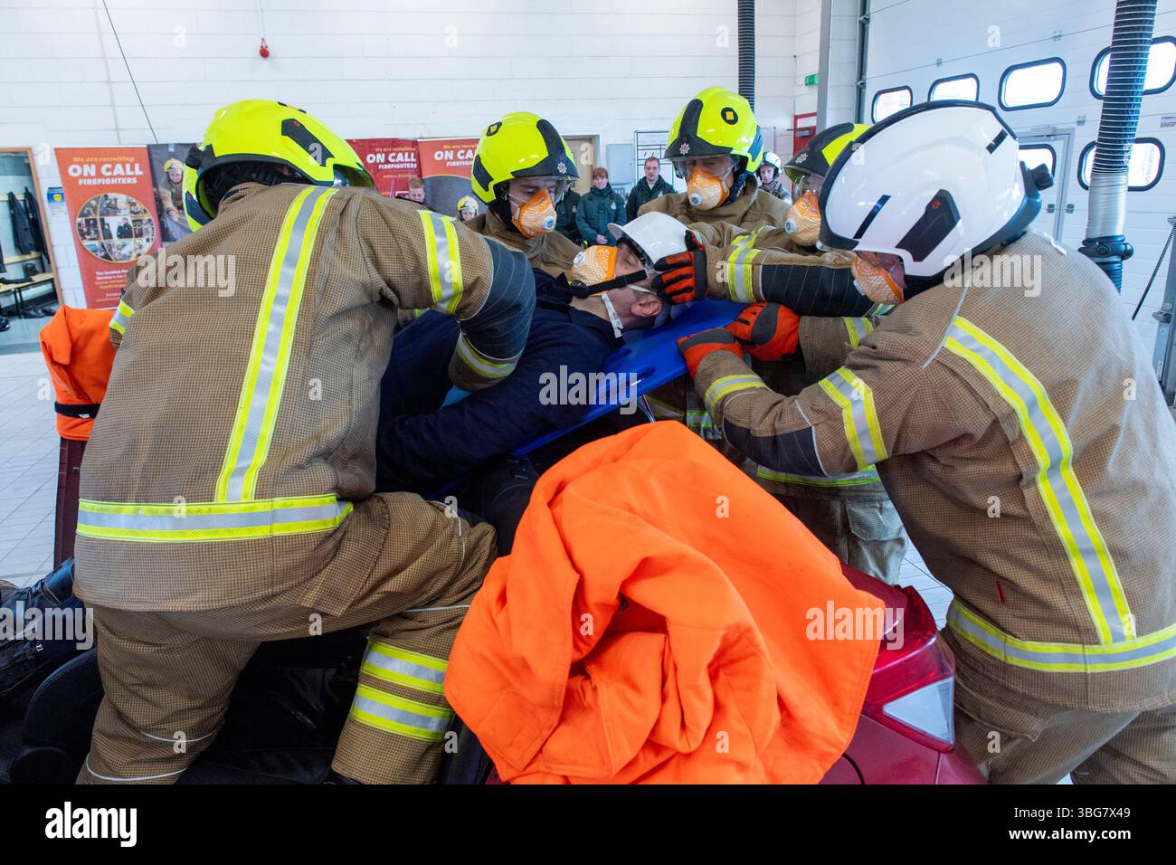 Scottish Fire and Rescue Service trainee firefighters during training ...