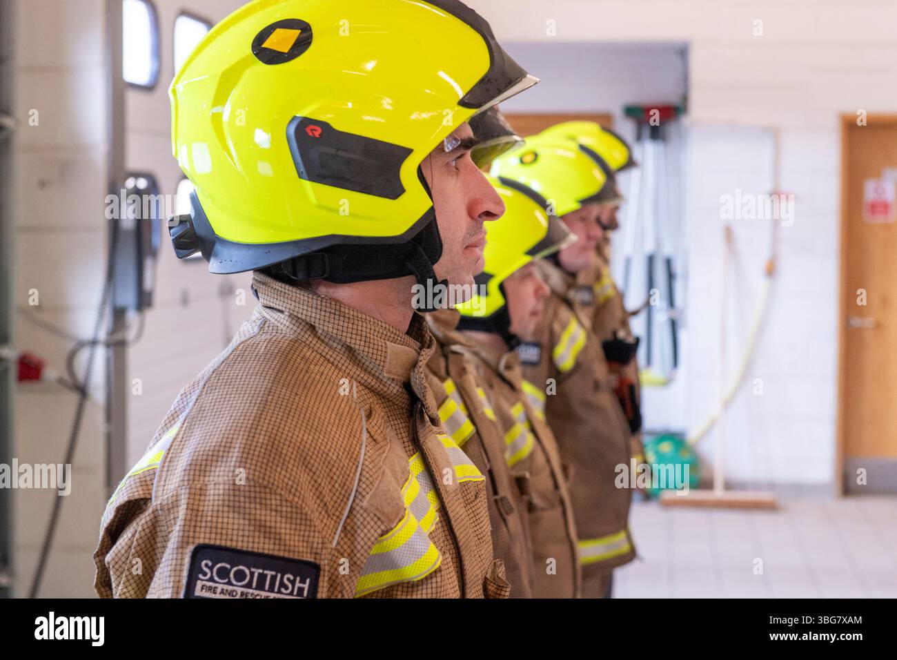 Scottish Fire and Rescue Service trainee firefighters during training ...