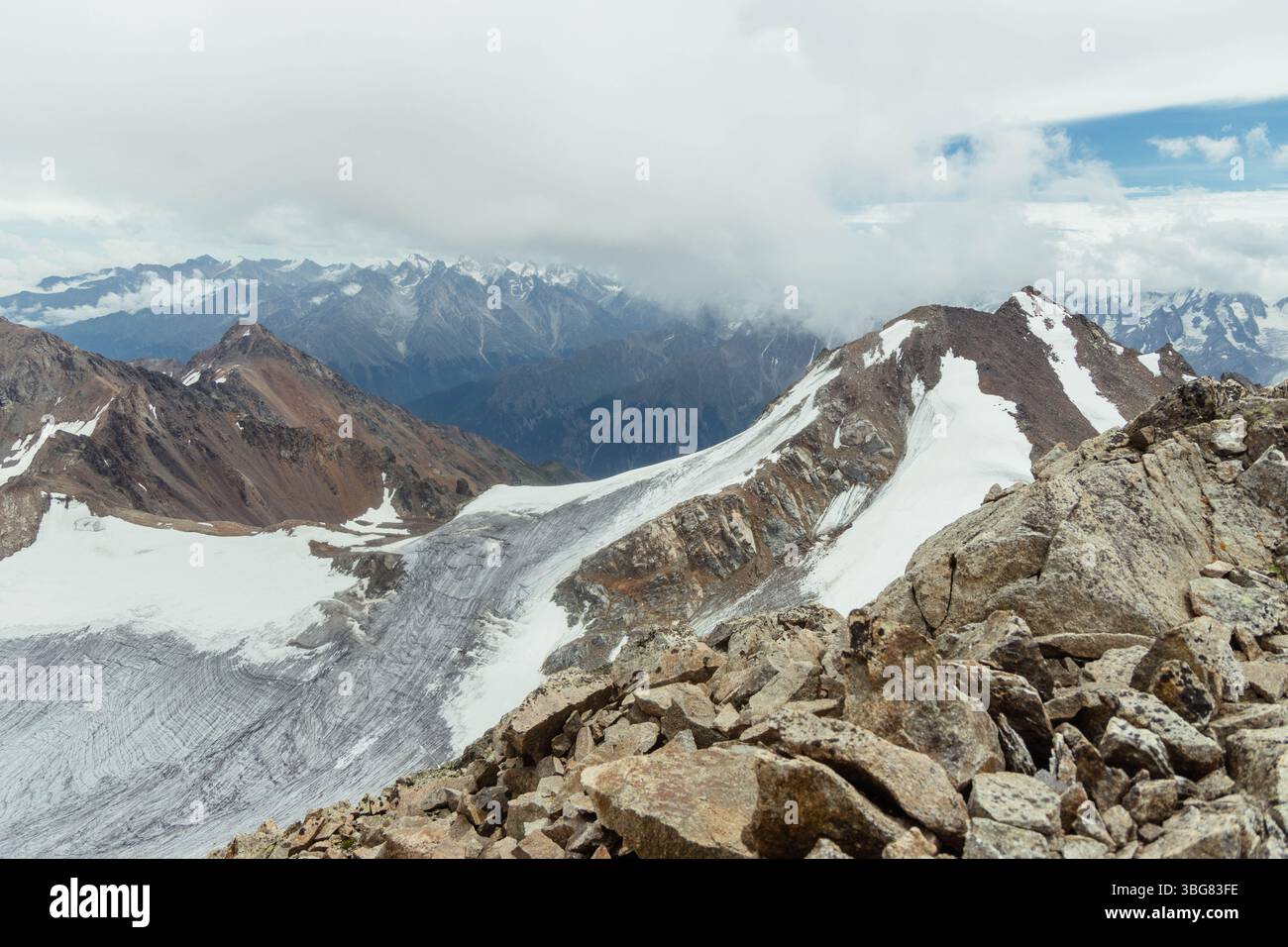 Spectacular view from a mountain peak reveals expansive glaciers and ...