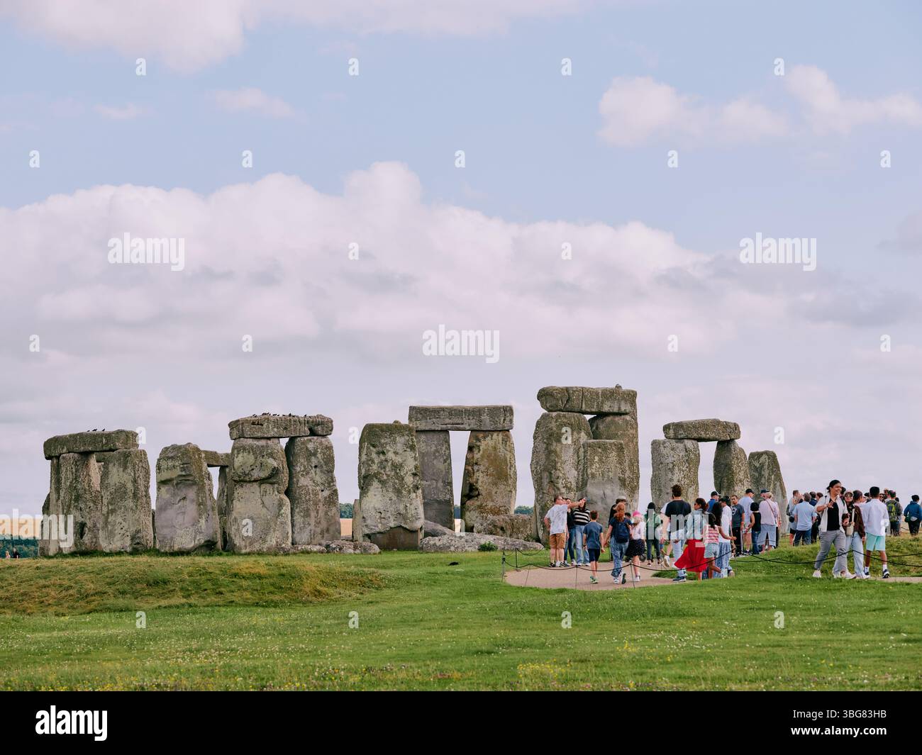 Tourists visiting Stonehenge a prehistoric megalithic structure on ...