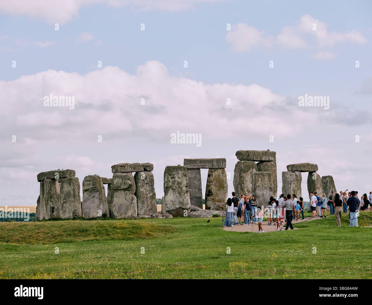 Tourists visiting Stonehenge a prehistoric megalithic structure on ...