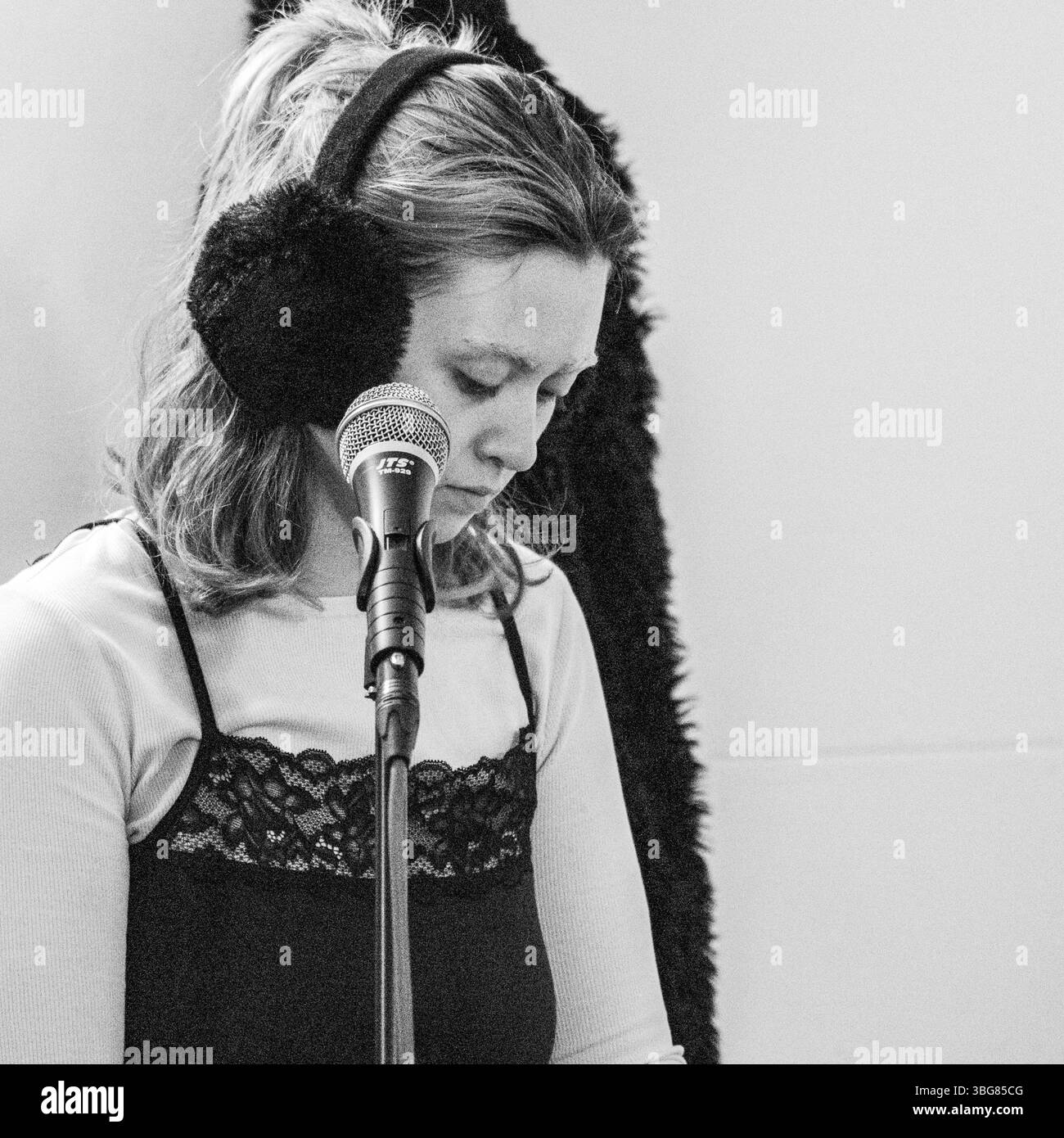 Female vocalist recording vocals in hi-res stock photography and images ...