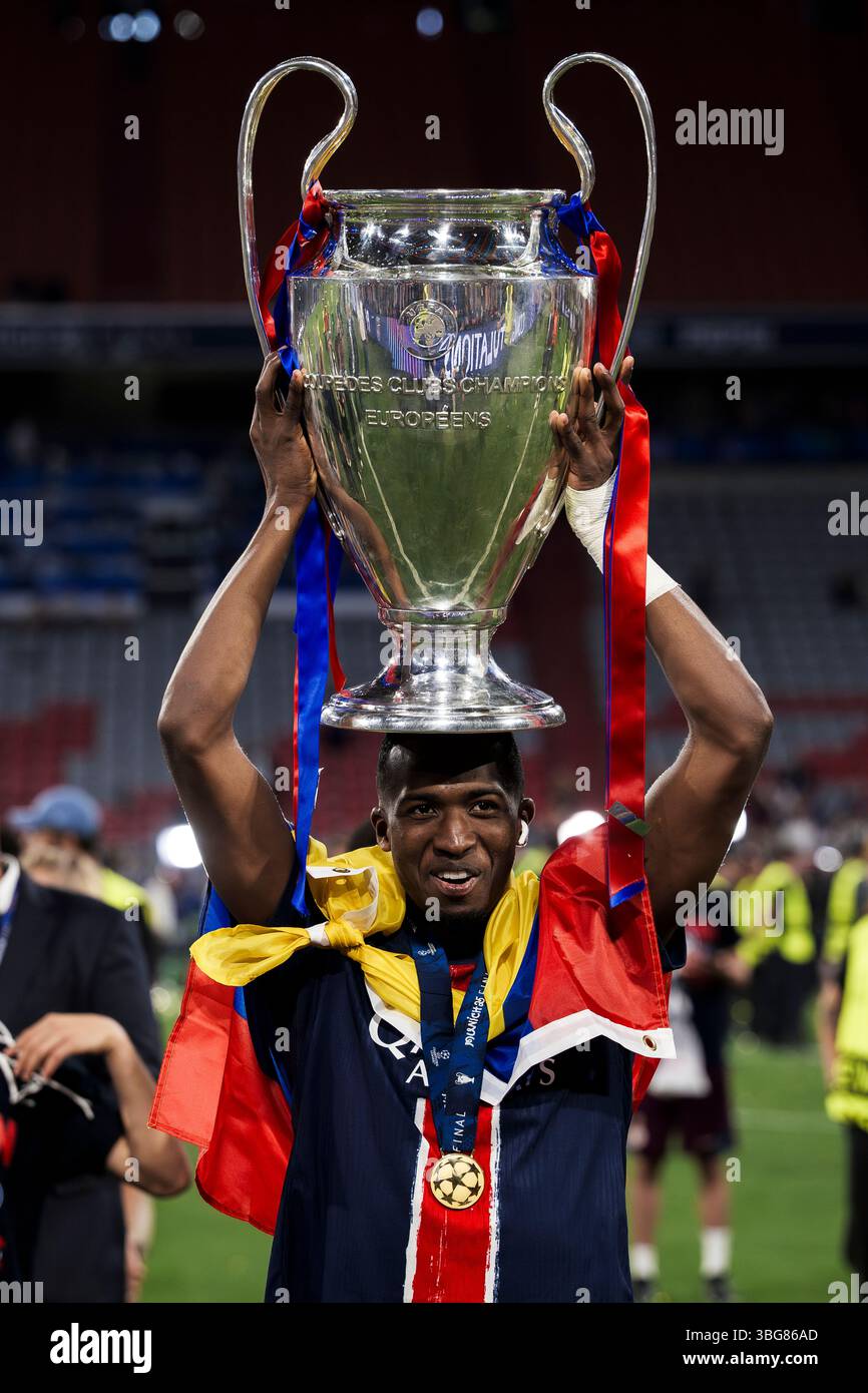 Nuno Mendes of Paris Saint-Germain FC lifts the trophy during the award ...