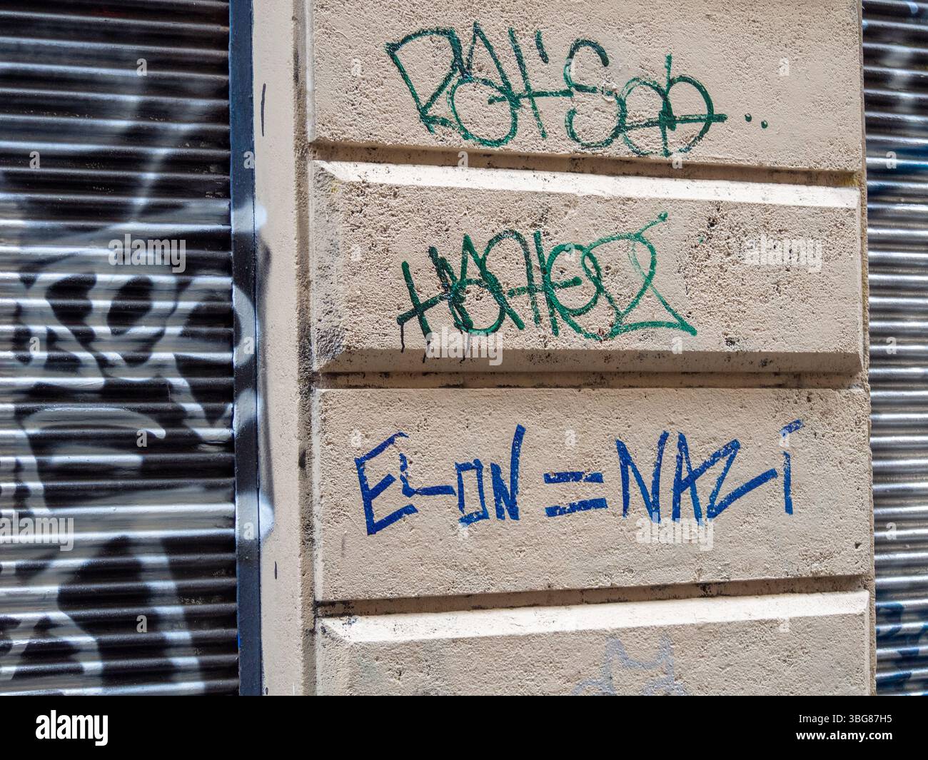 Anti-Musk graffitti reading ELON=NAZI seen on a street in Paris, France ...