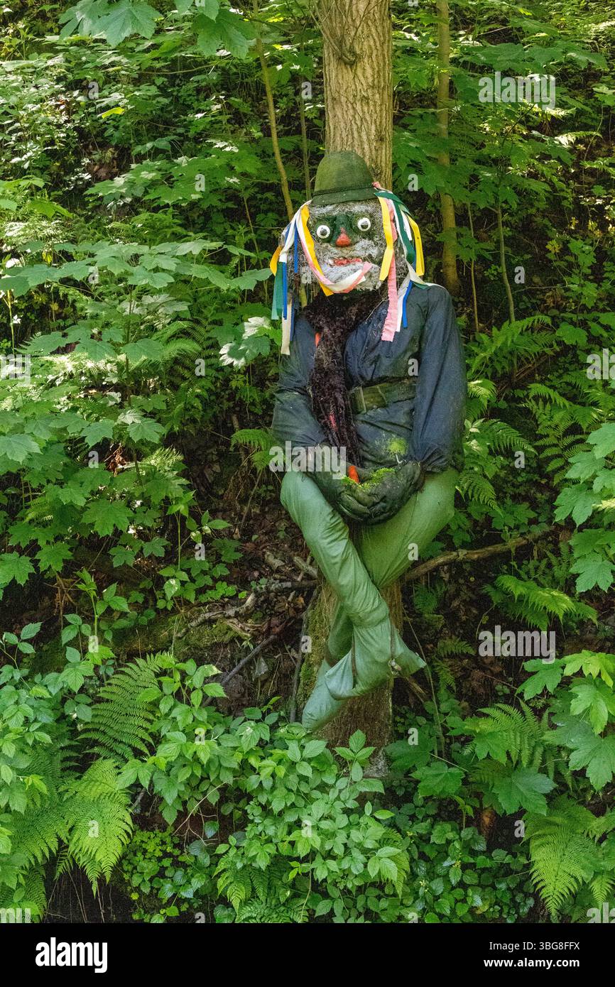 Whimsical forest water sprite figure dressed in green with colorful ...