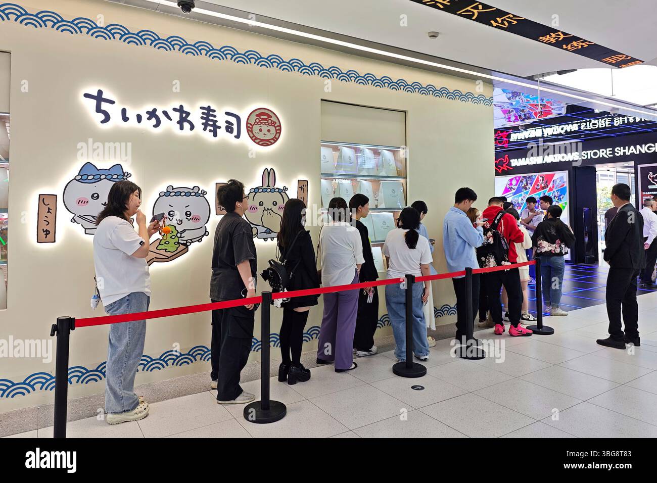 Fans line up to shop in the pop-up store of Chiikawa Sushi themed goods ...