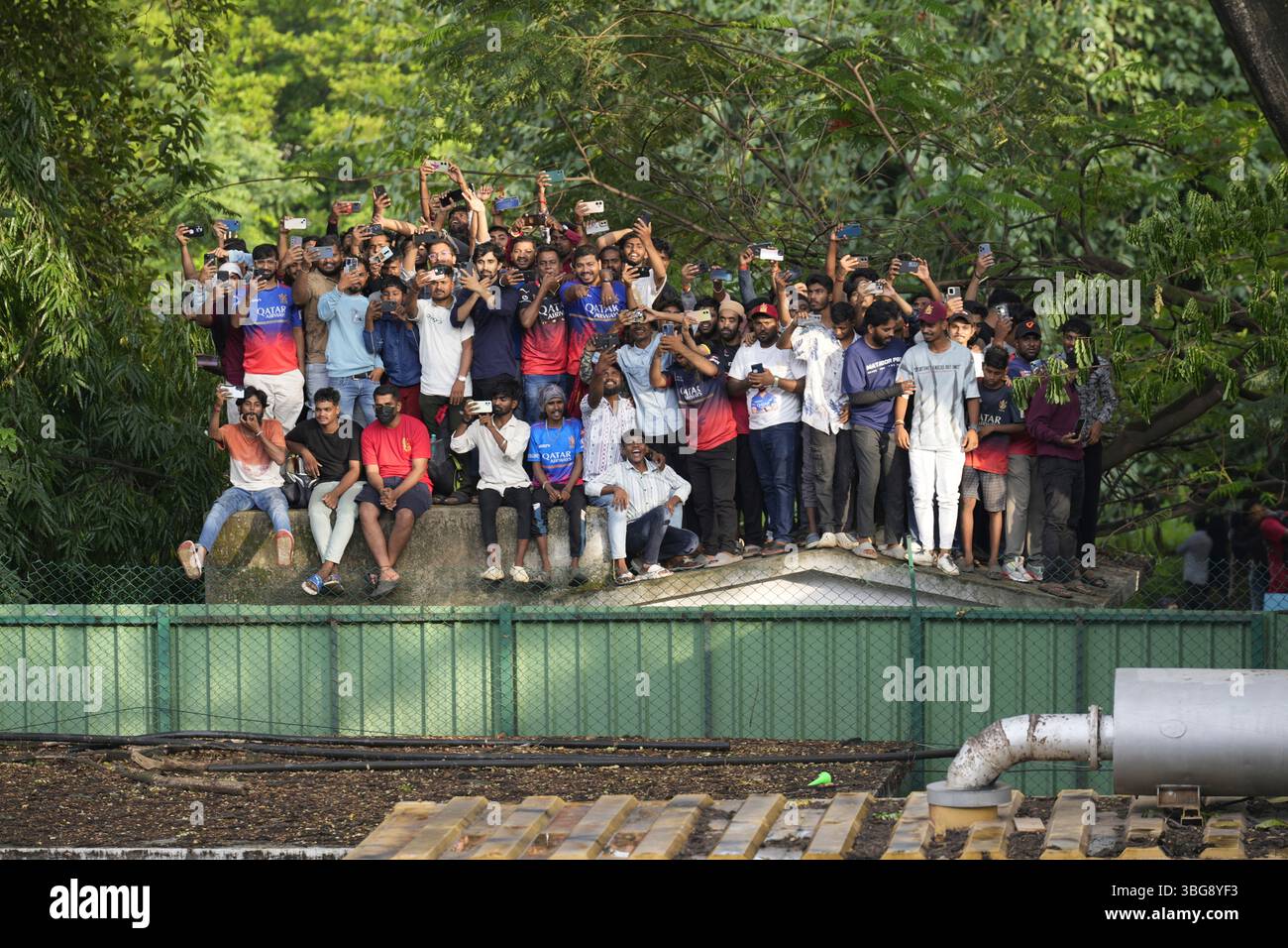 Fans cheer for Royal Challengers Bengaluru cricketers, winners of the ...