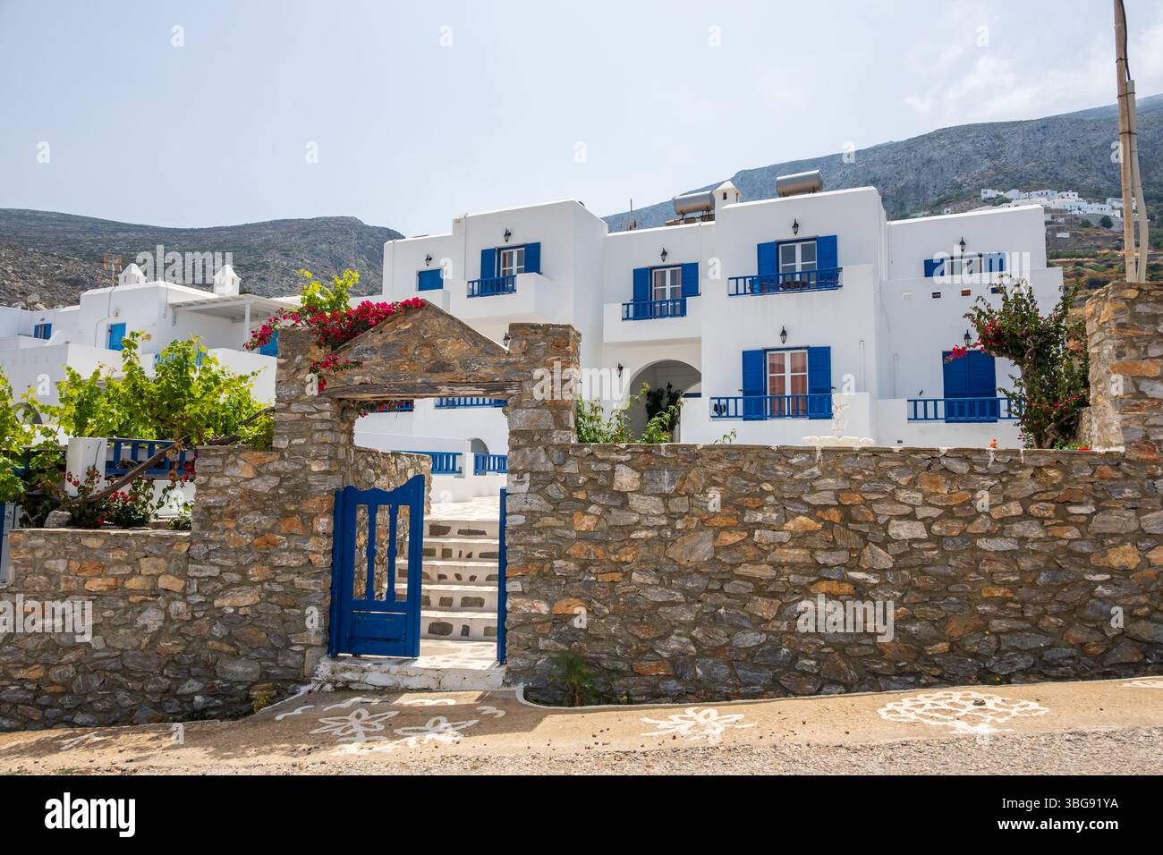 Typical Greek houses in traditional Cycladic style. Aegiali village ...