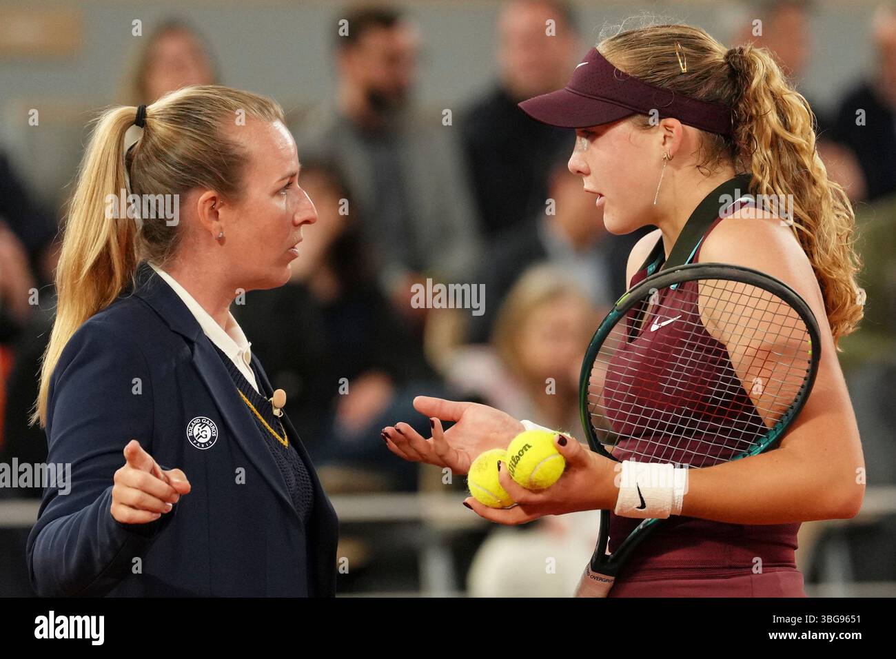 Russia's Mirra Andreeva, right, speaks with umpire Miriam Bley during ...
