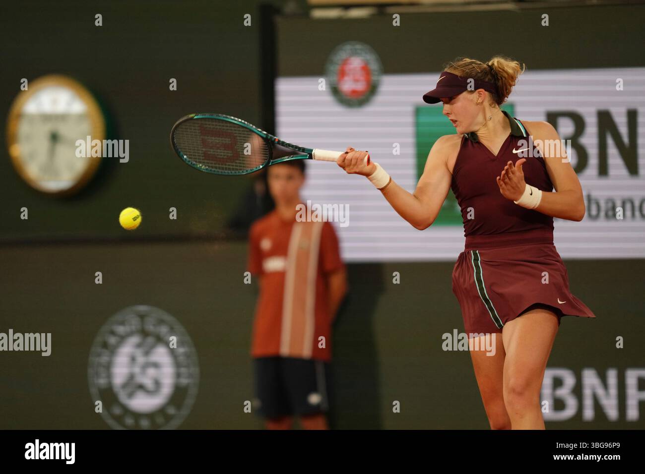 Russia's Mirra Andreeva plays a shot against France's Lois Boisson during their quarterfinal ...