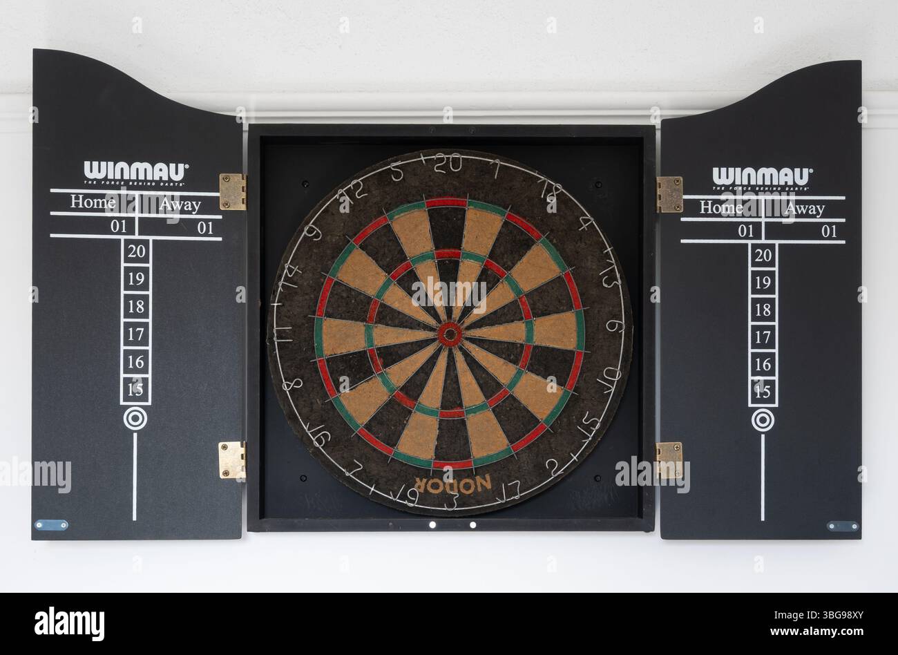 Dart board in cabinet hi-res stock photography and images - Alamy