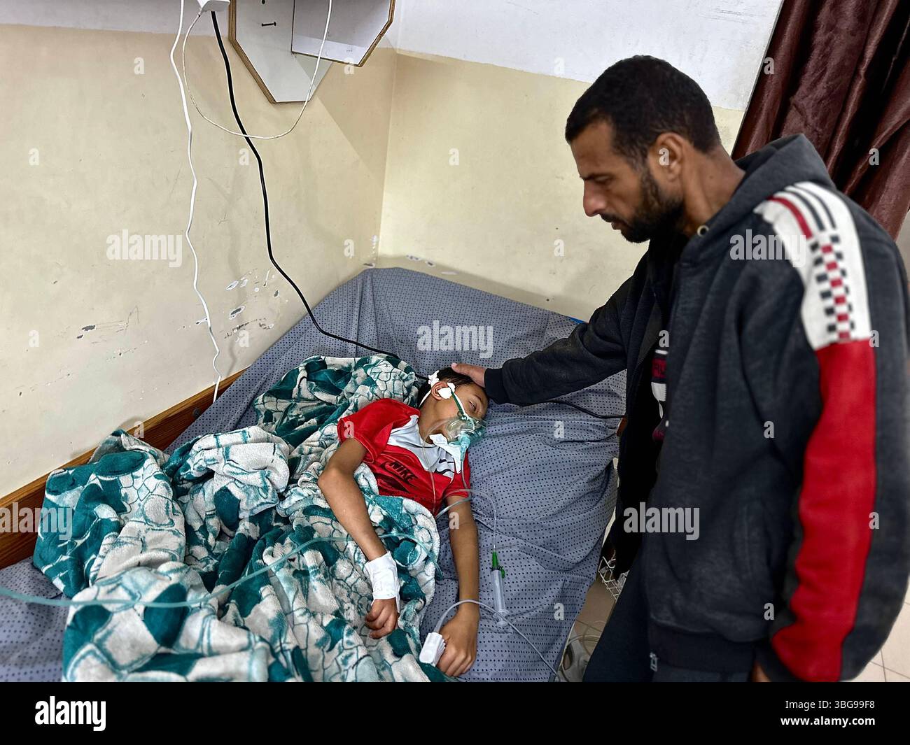 Palestinian children are receiving medical care at Nasser Medical ...