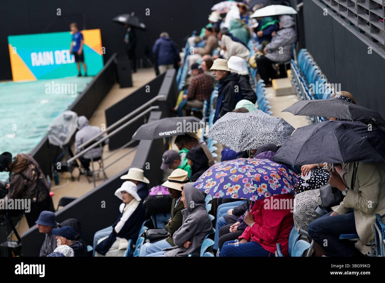 Spectators during a rain delay on day three of the Lexus Birmingham ...