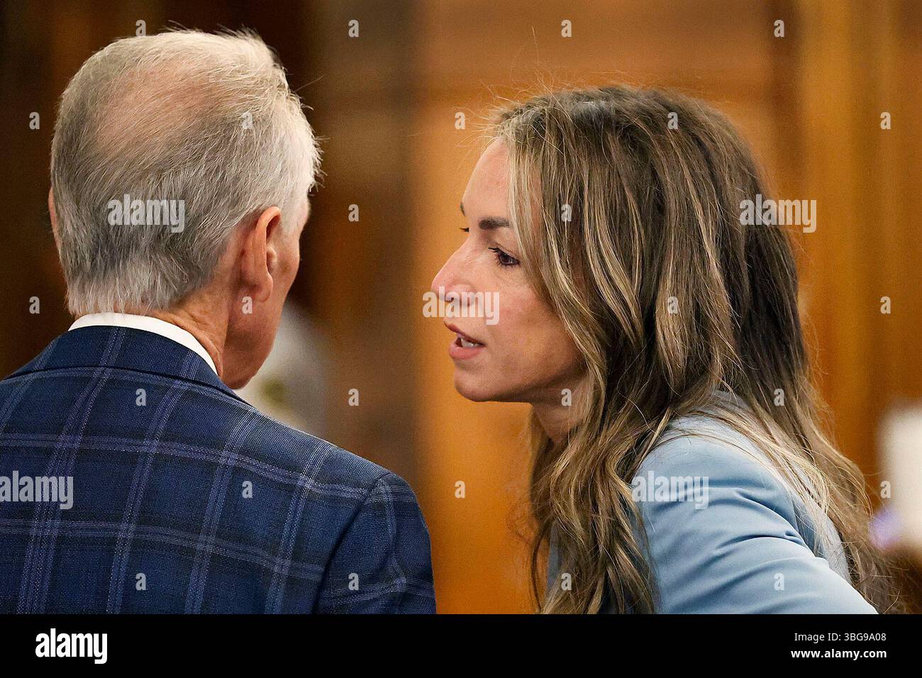 Kare Read, right talks with her parents William and Janet Read during a ...