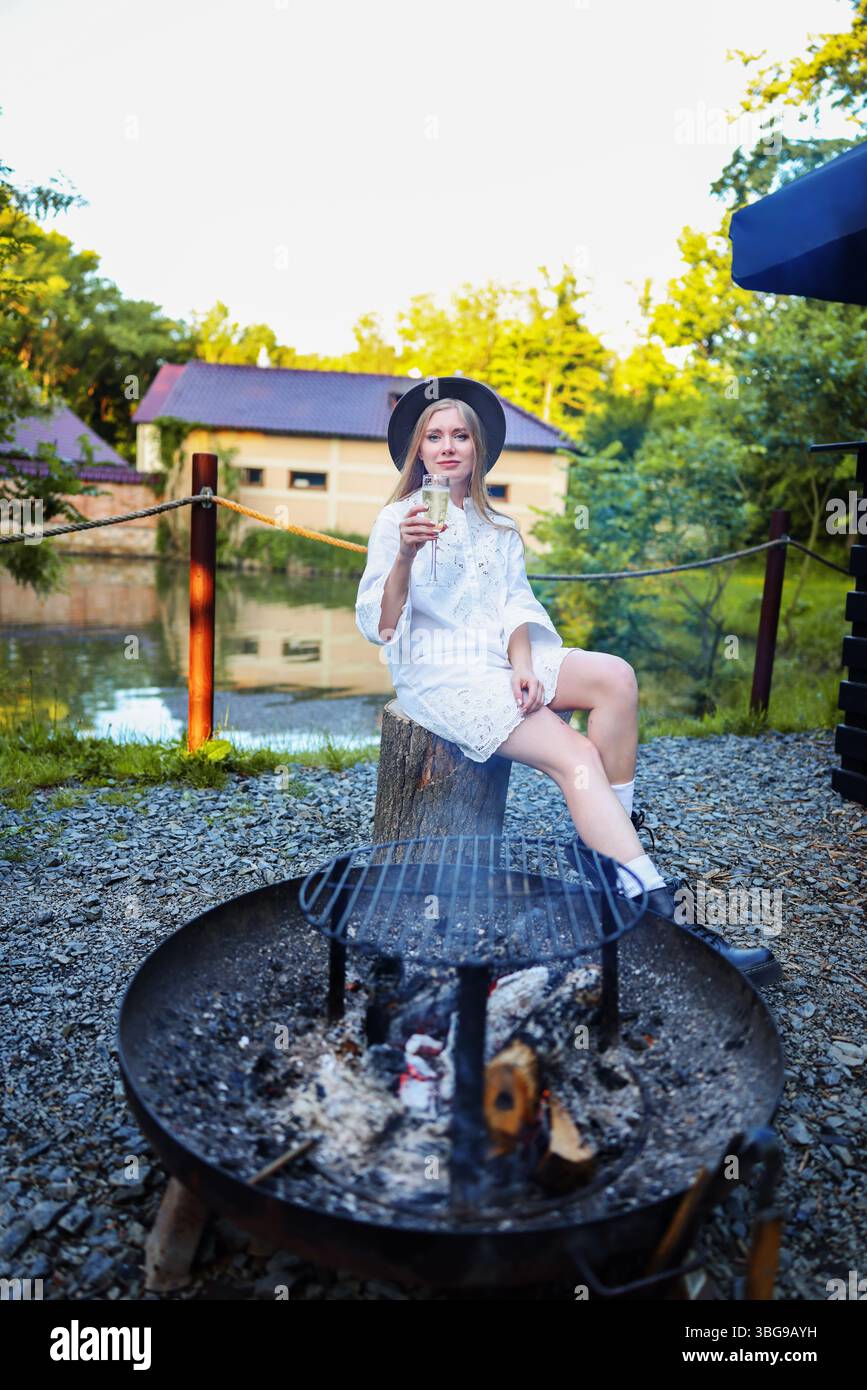 Sitting beside fire hi-res stock photography and images - Alamy