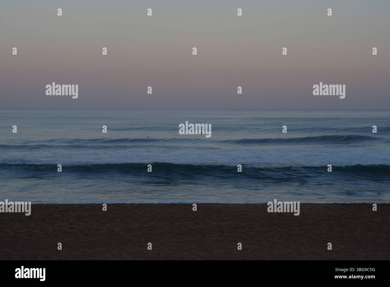 Calm ocean waves reflecting sunset hi-res stock photography and images ...
