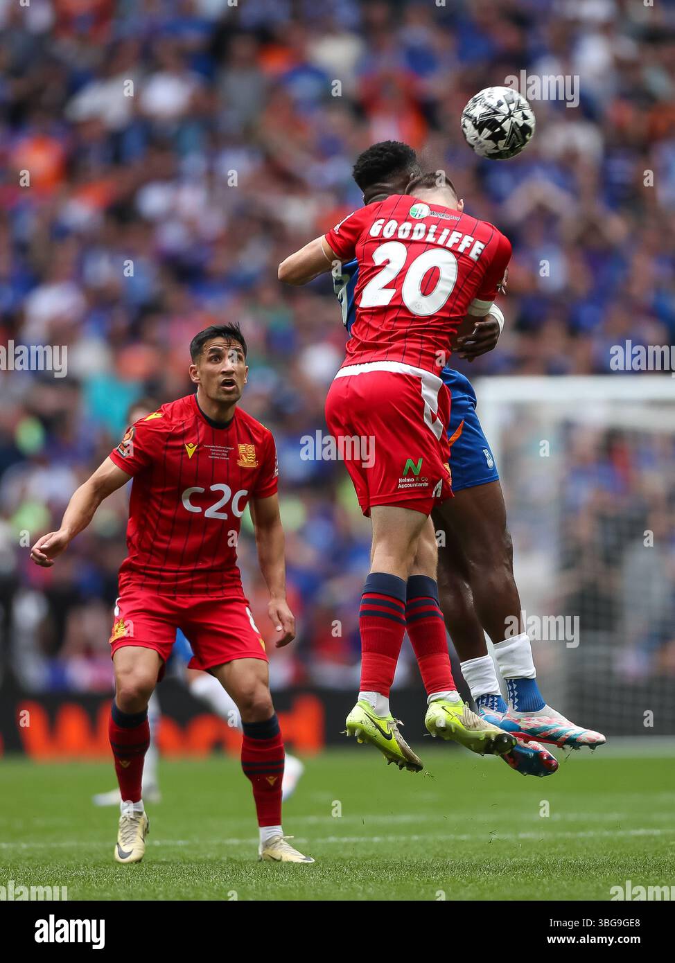 Mike Fondop of Oldham Athletic and Ben Goodliffe of Southend United go ...