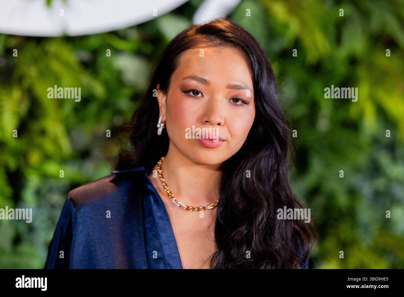 Cologne, Germany. 04th June, 2025. Andrea Guo, actress, stands at a ...