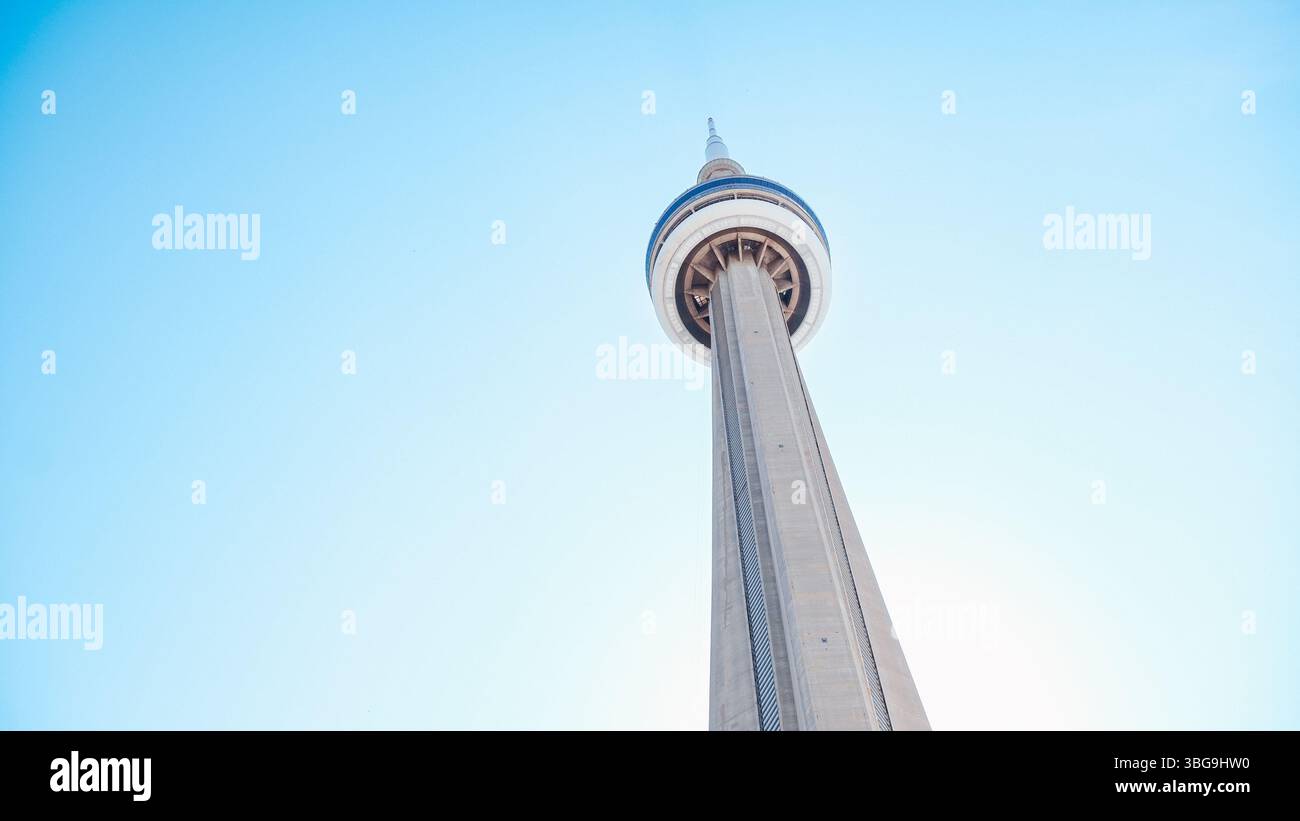 TORONTO, ON Canada - July 4, 2024: Iconic Tower Ascending to Azure ...