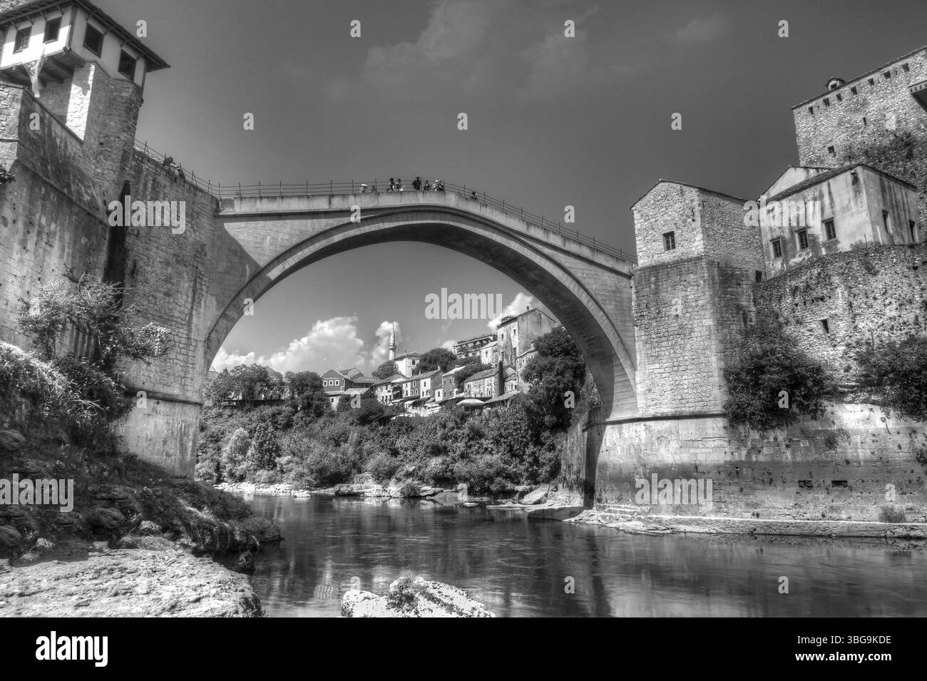 The old bridge over the river Neretva in the city of Mostar during day ...