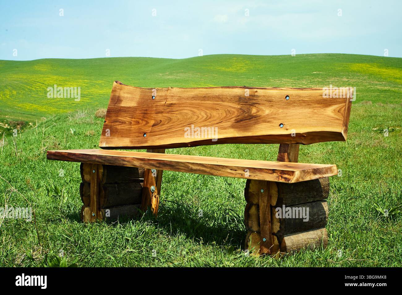 Rustic wooden bench on a scenic viewpoint near Champagne village ...