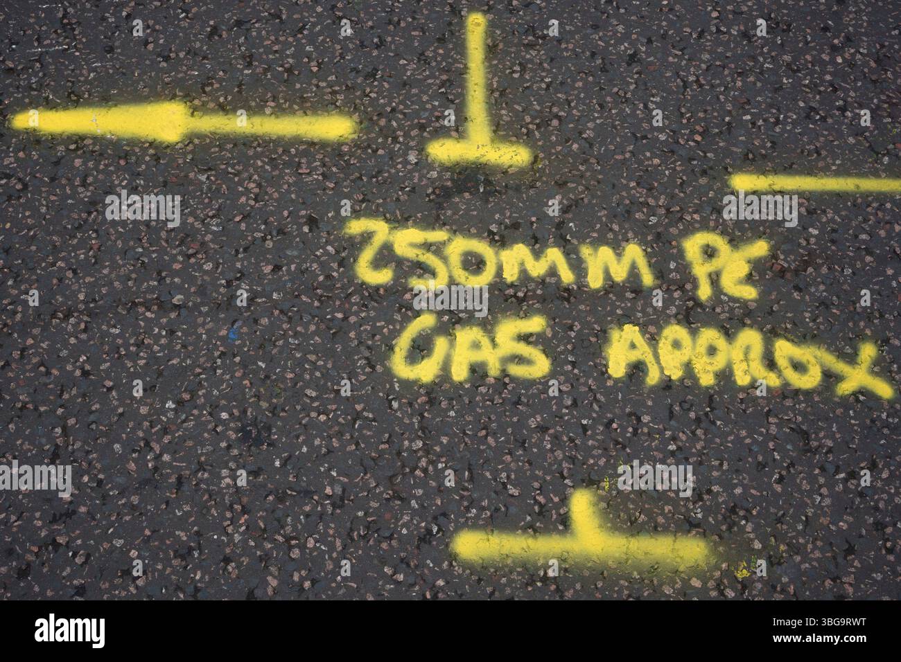 A spectrum of landscape colour of utility marks on the asphalt of a ...