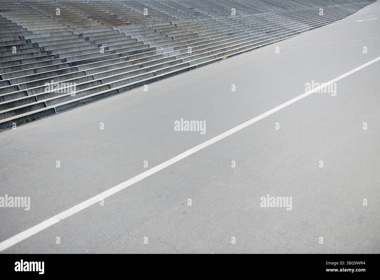 Elevated diagonal view of a footpath with white dividing line and ...