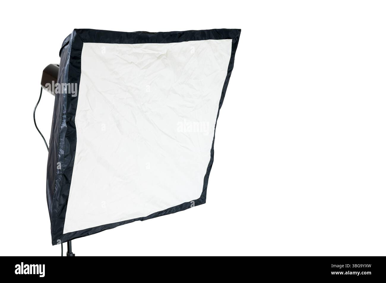 Compact studio flash unit with square softbox in front of a white ...