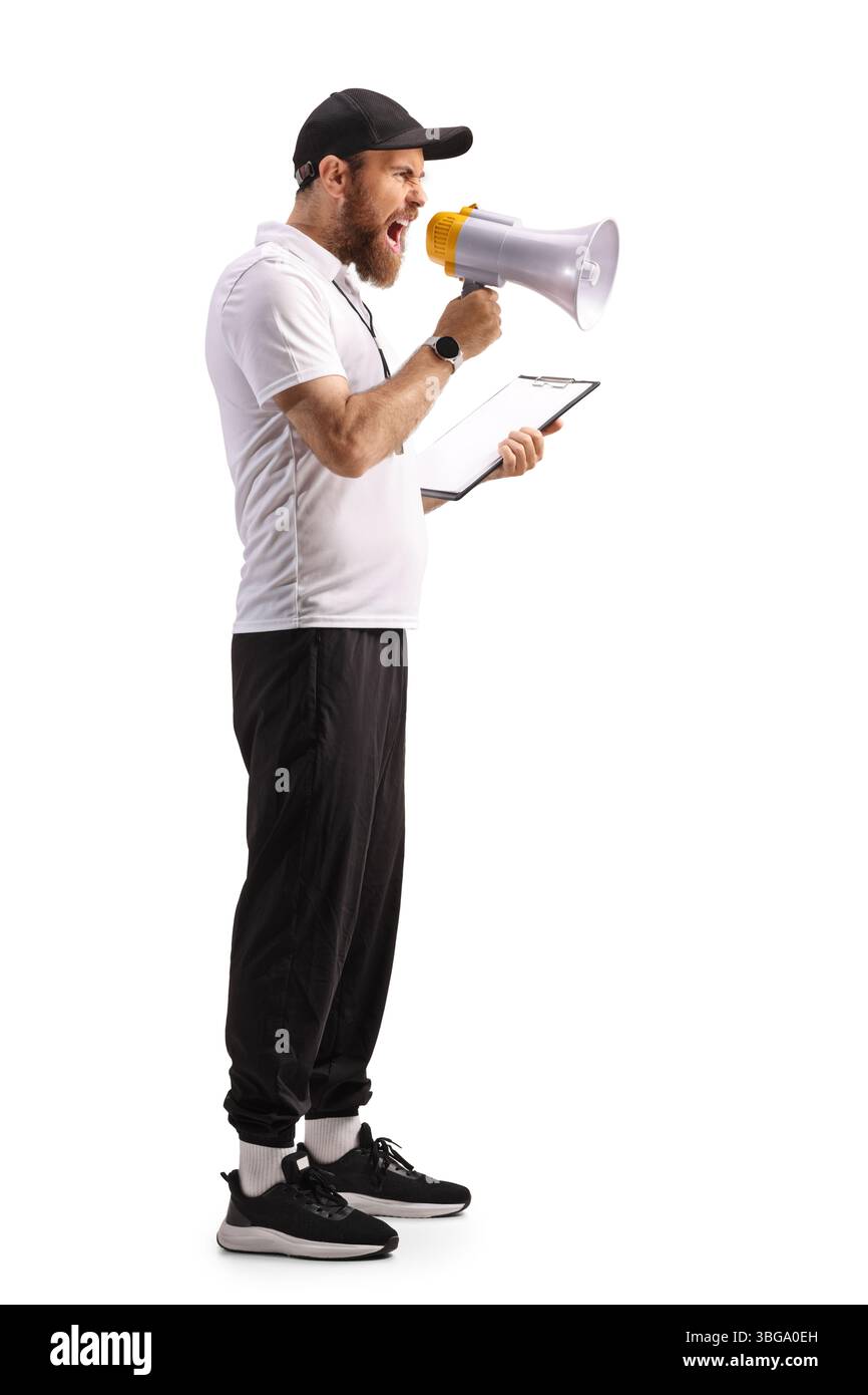 Full length profile shot of a sports coach shouting with a megaphone ...