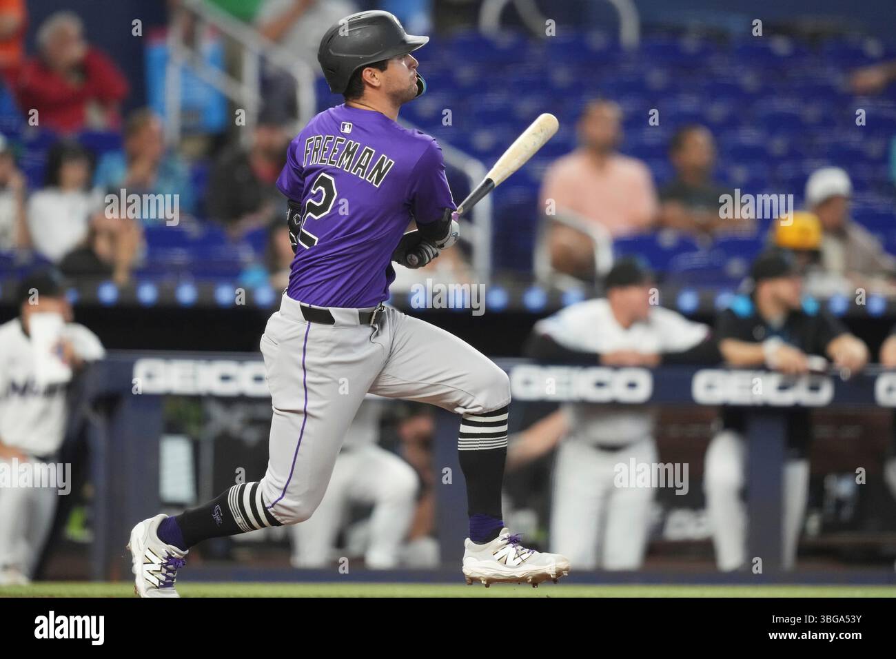 Colorado Rockies' Tyler Freeman (2) watches after hitting a double ...