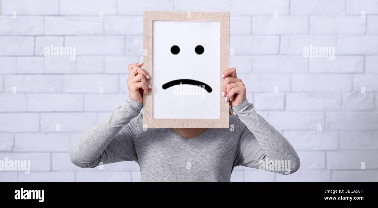 Depression, sadness, negative emotions concept. Young woman holding ...