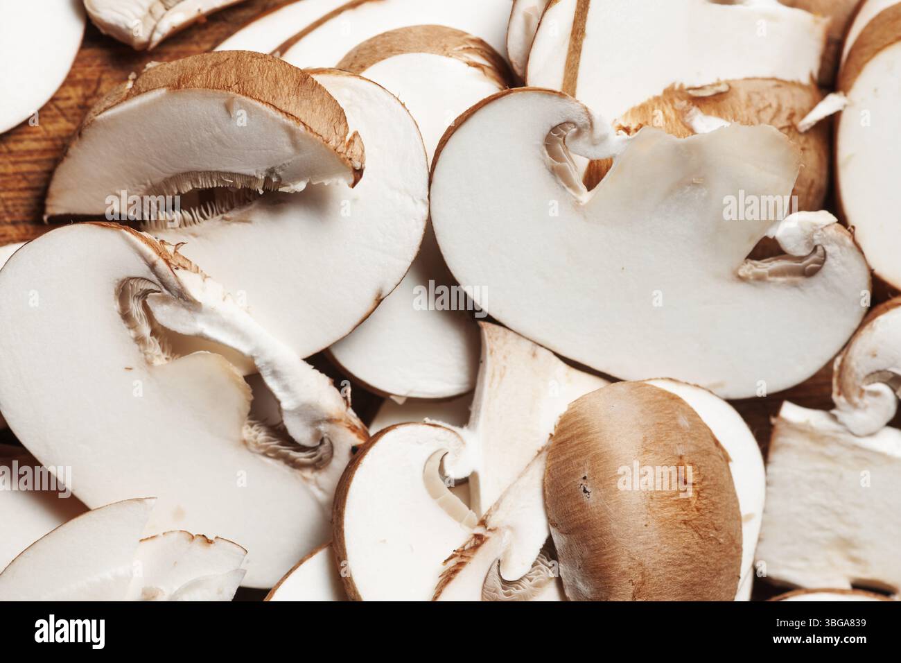 Full-size view of sliced mushrooms Stock Photo - Alamy