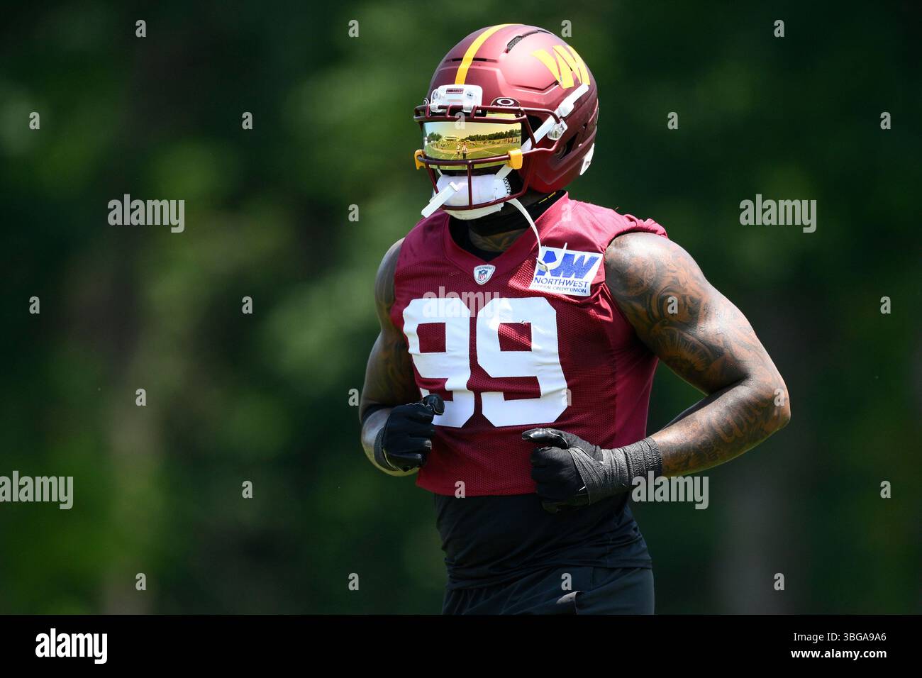 Washington Commanders defensive end Clelin Ferrell (99) works out ...