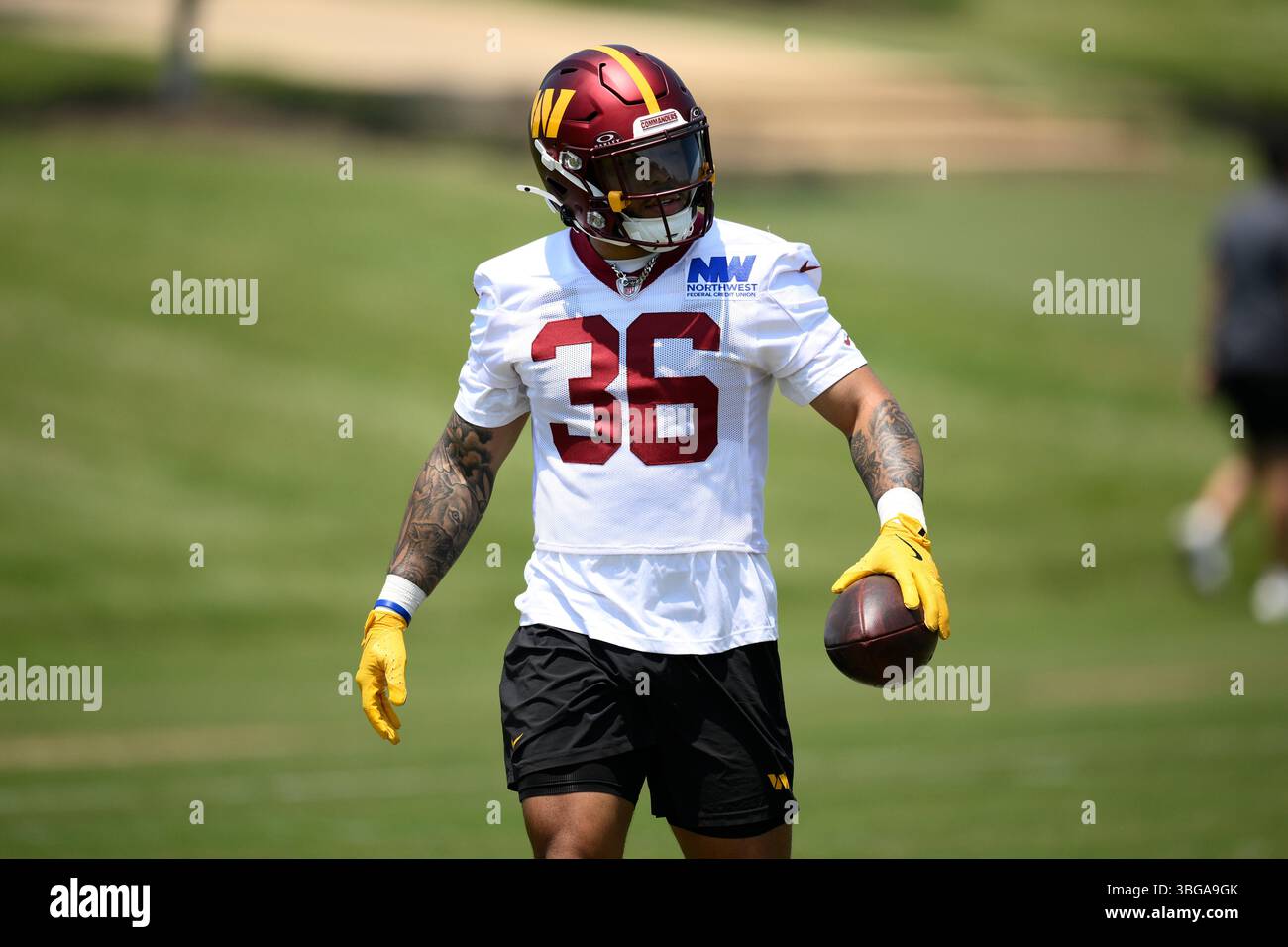 Washington Commanders running back Chris Rodriguez Jr. (36) works out ...