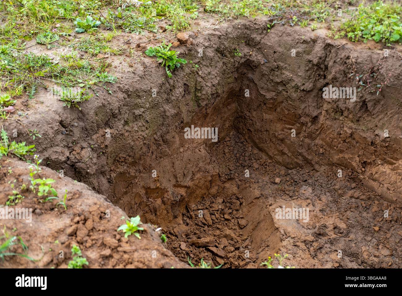 deep excavation site in earth, showcasing preparations for underground ...