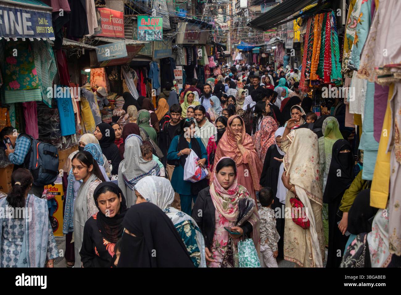 Kashmiri Muslims shop ahead of the Muslim festival Eid-al-Adha at a ...