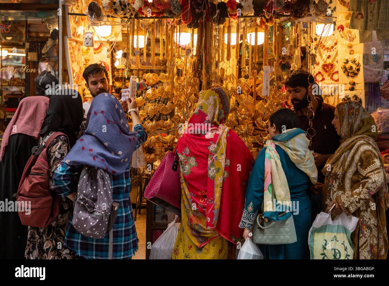 Kashmiri Muslim women shop at a jewellery shop ahead of the Muslim ...