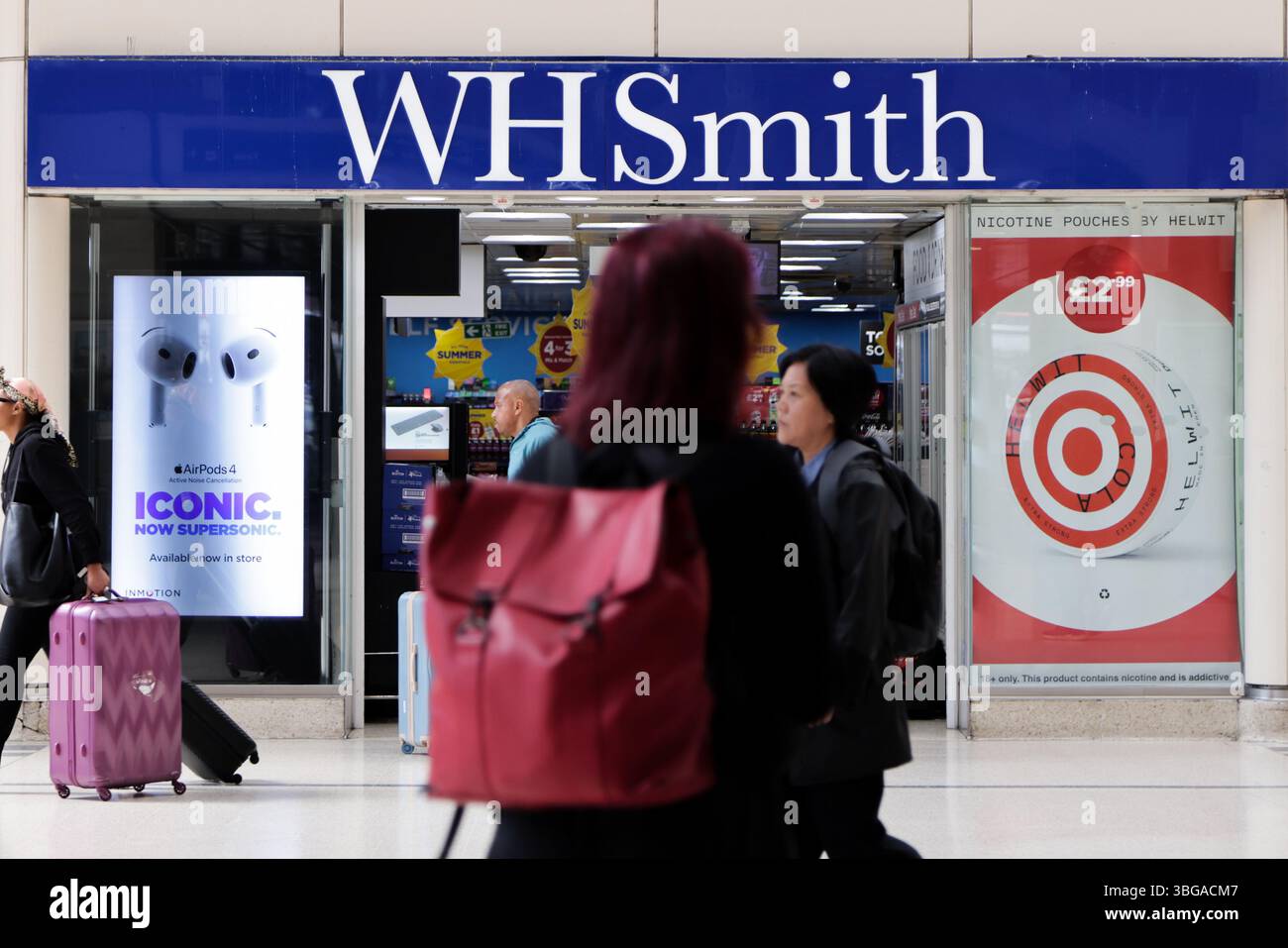 London, UK. 4th June, 2025. People walk past a branch of WHSmith store ...