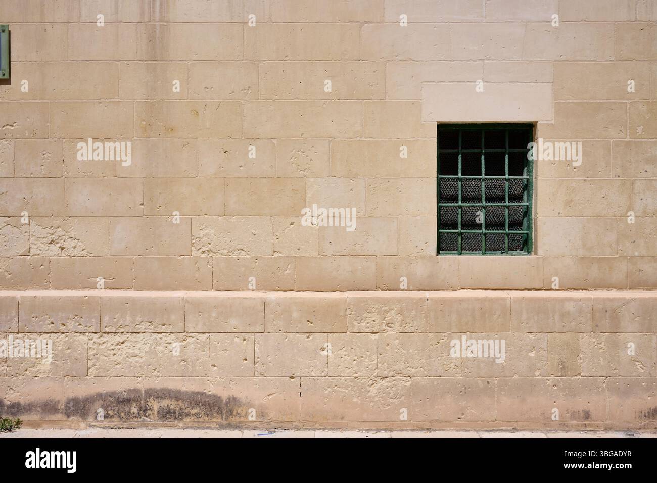 window barred with metal grate Stock Photo - Alamy