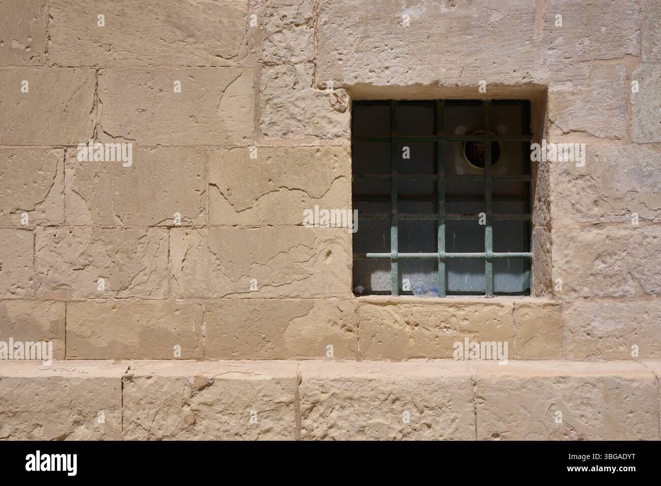 window barred with metal grate Stock Photo - Alamy