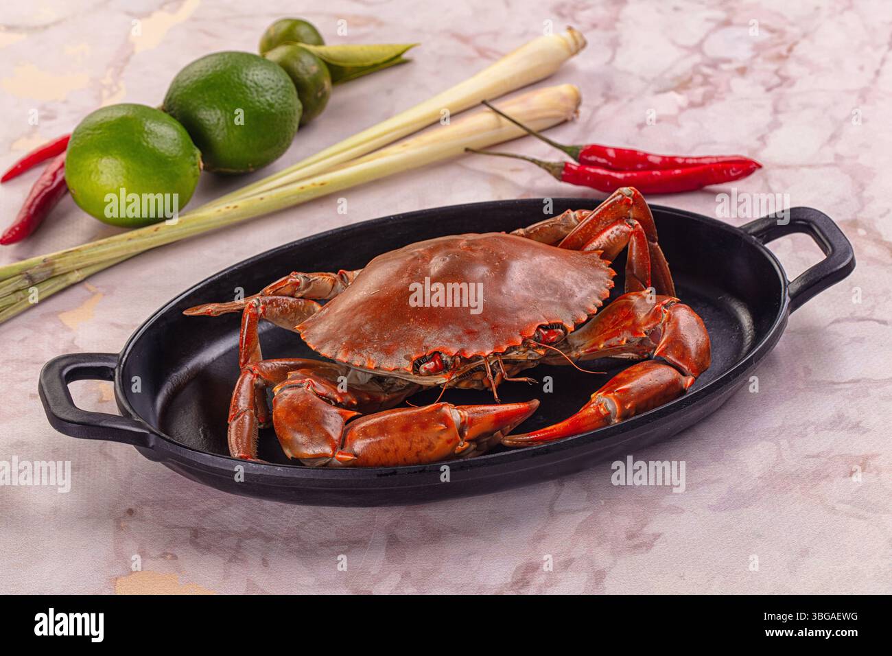 Gourmet steamed wild crab served lime Stock Photo - Alamy
