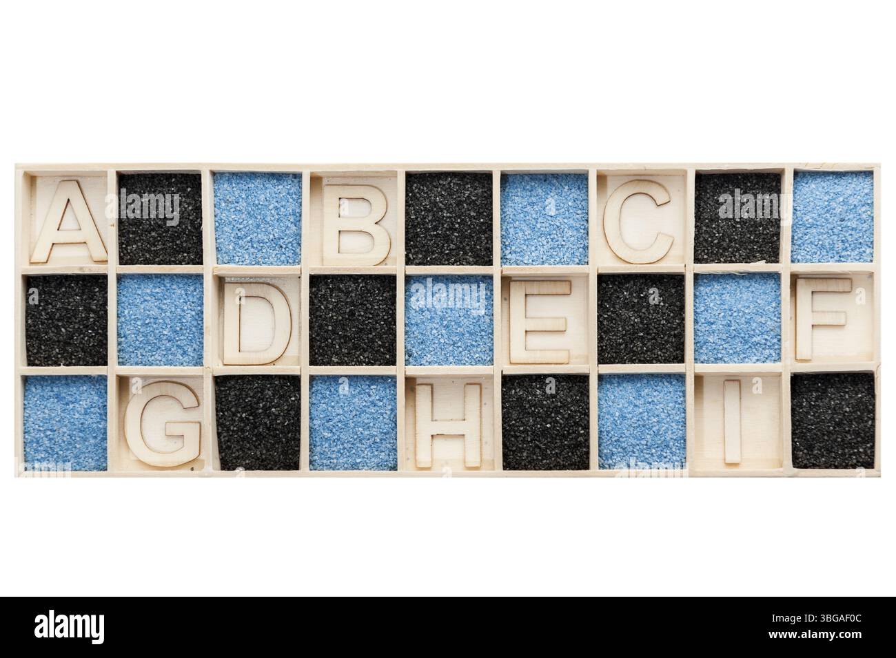 Rectangular wooden box with square compartments partially filled with ...