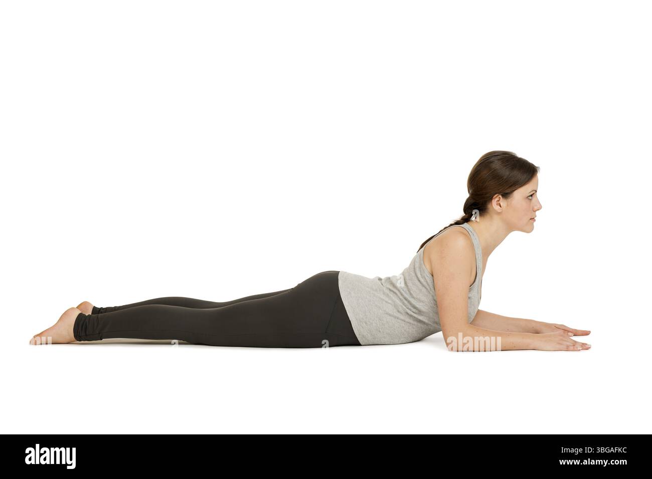 Side full body view of a young woman white background showing the yoga ...