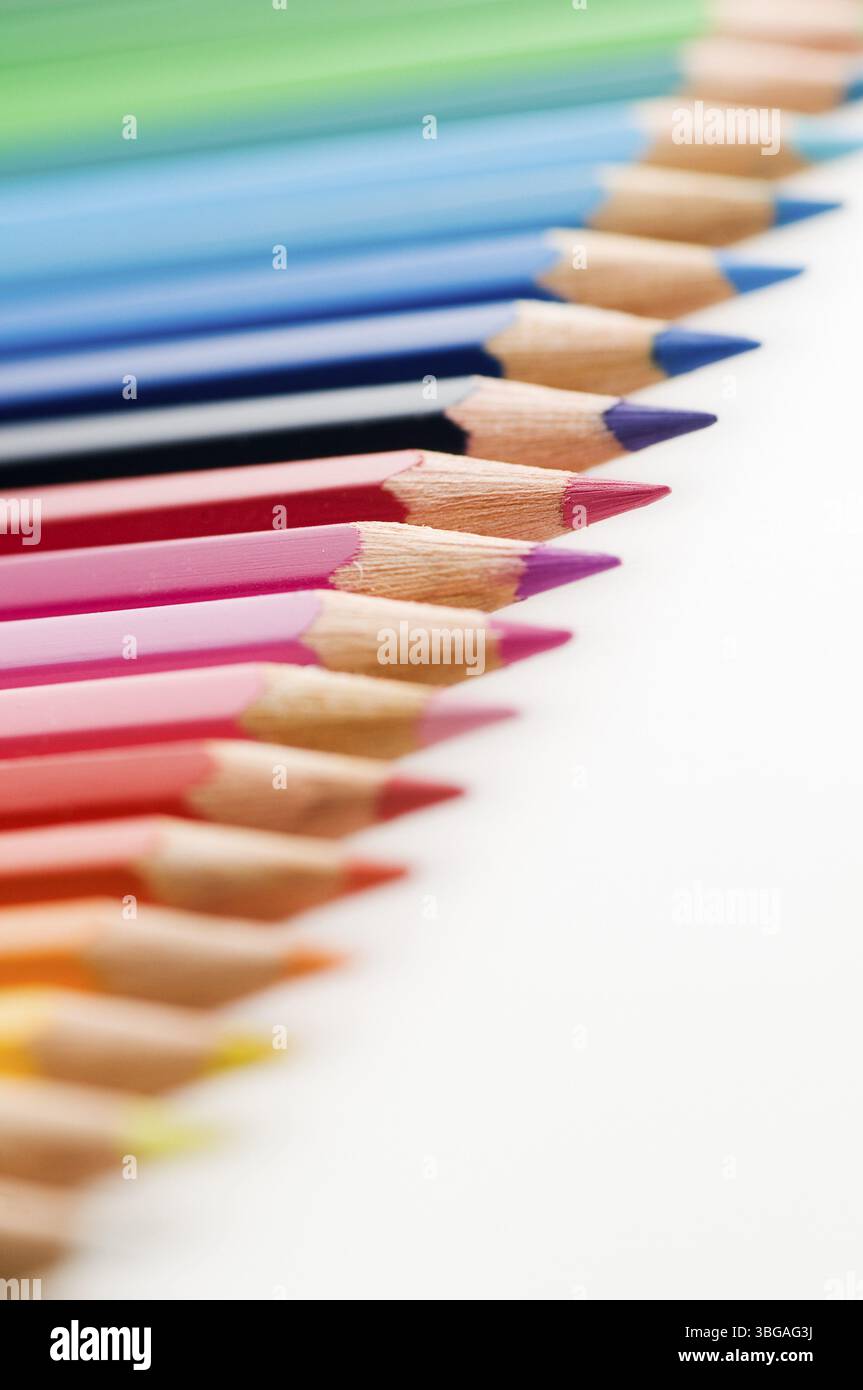 Flat-angle close-up of crayons arranged horizontally in parallel and ...