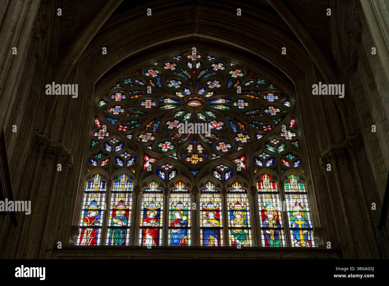 Magnificent rose window displays intricate stained glass patterns ...