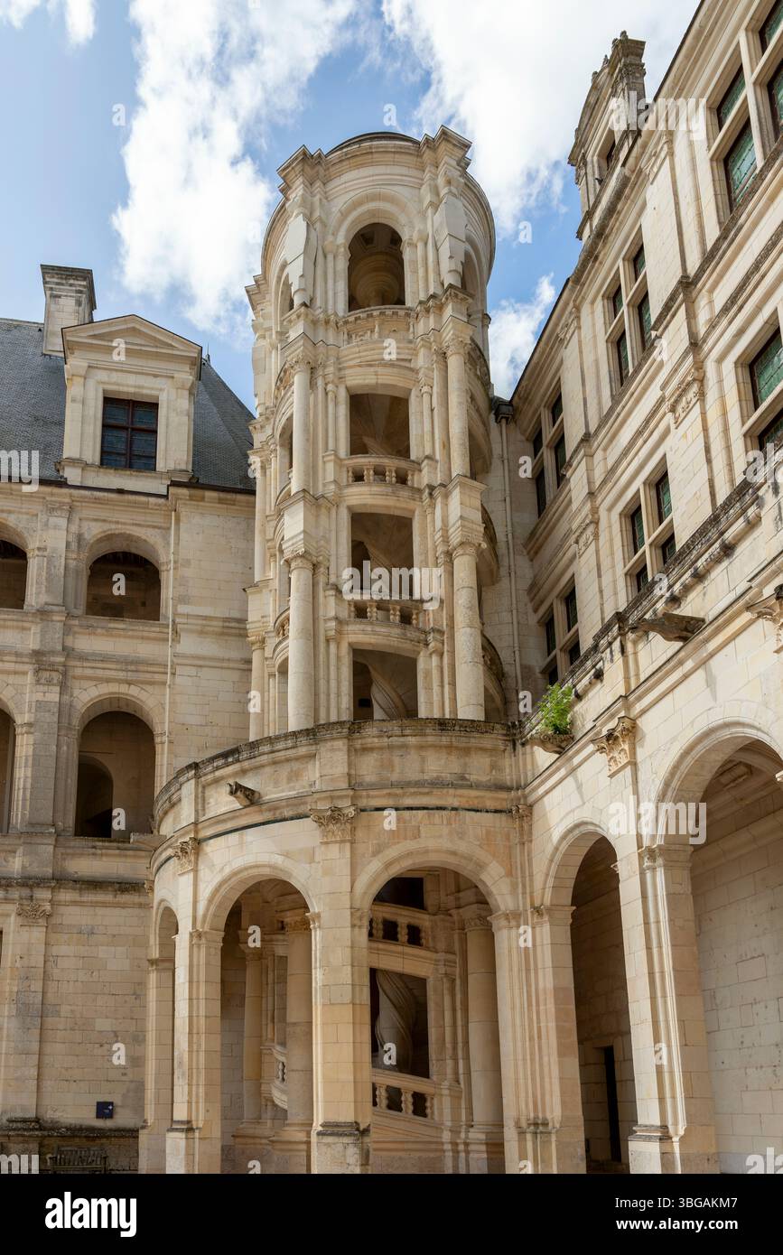 Imposing cylindrical tower with ornate stonework displays classic ...