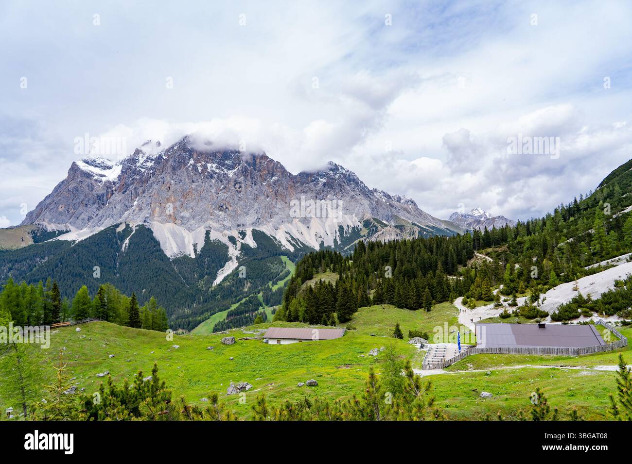 Scenic alpine landscape with Zugspitze and mountain huts, Tirol ...