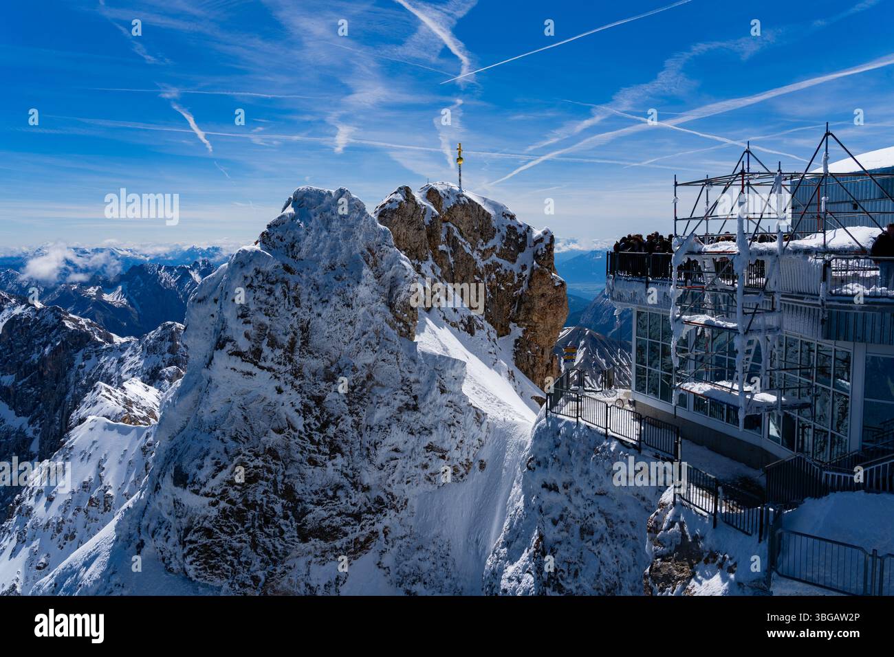 Tourists at Icy Summit Platform Facing Golden Cross on Zugspitze ...