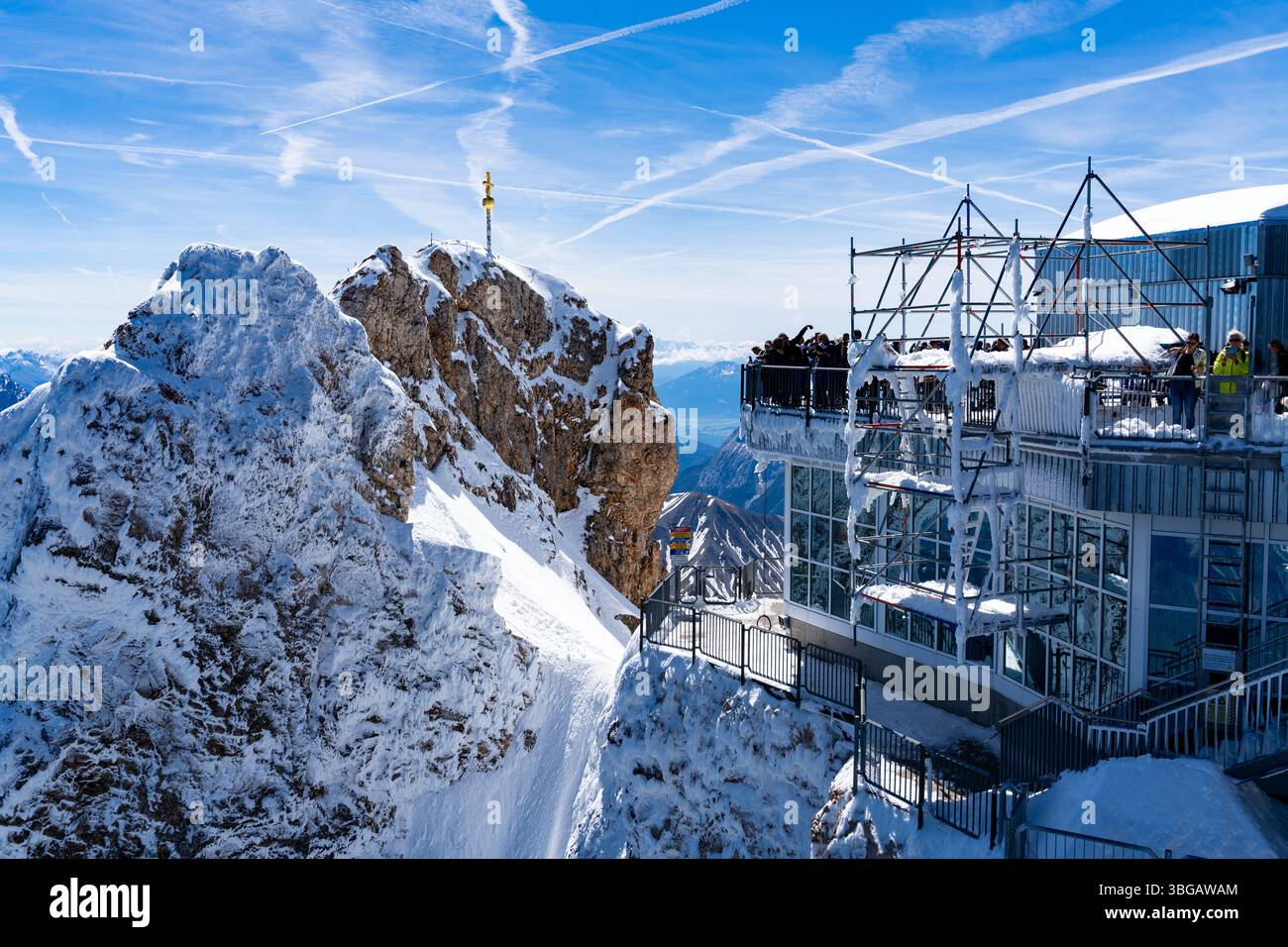 Tourists at Icy Summit Platform Facing Golden Cross on Zugspitze ...