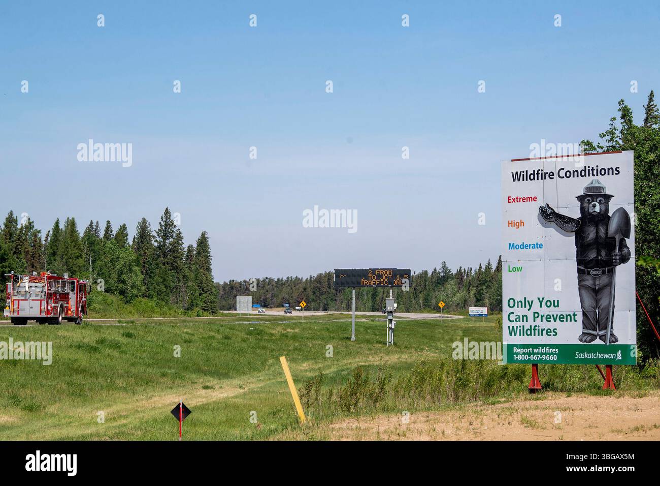 Volunteer firefighters from Davidson, Sask., load up their truck at the ...